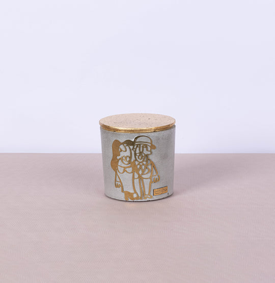 Large round concrete box with graffiti in copper and gold leaf lid ...